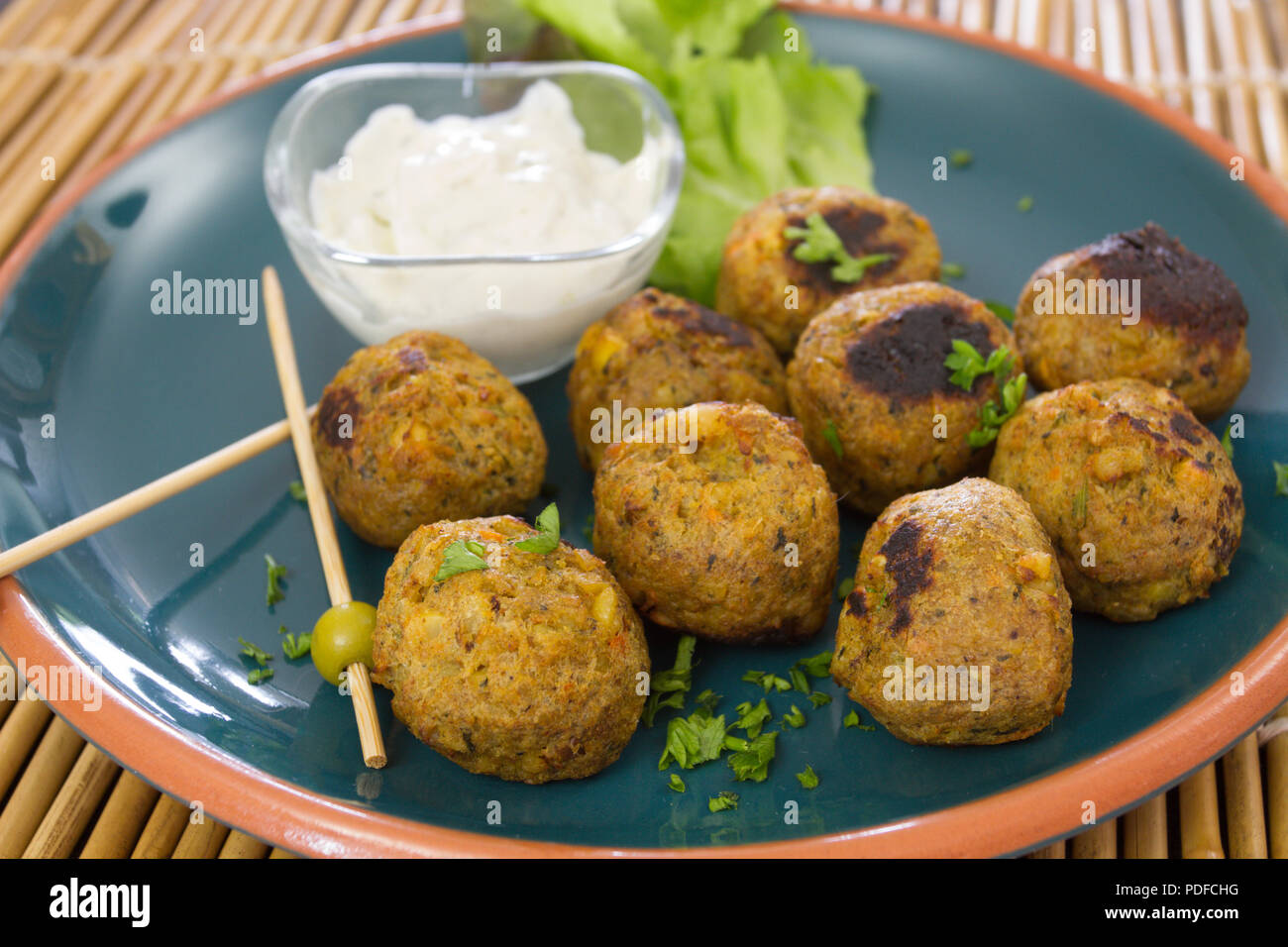 falafel ball and dip sauce Stock Photo - Alamy