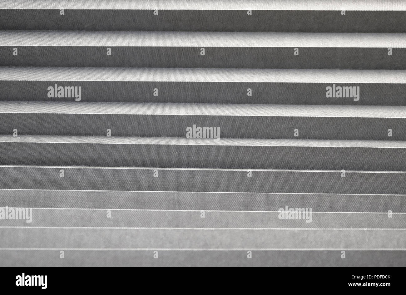 Corrugated grey curtain. Textured gray background. Folded like an ...