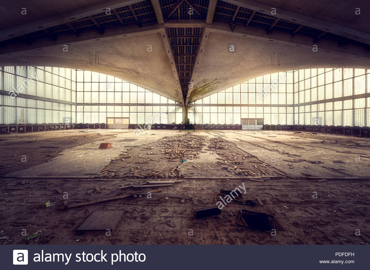 Decaying interior of an abandoned building with peeling paint and ...
