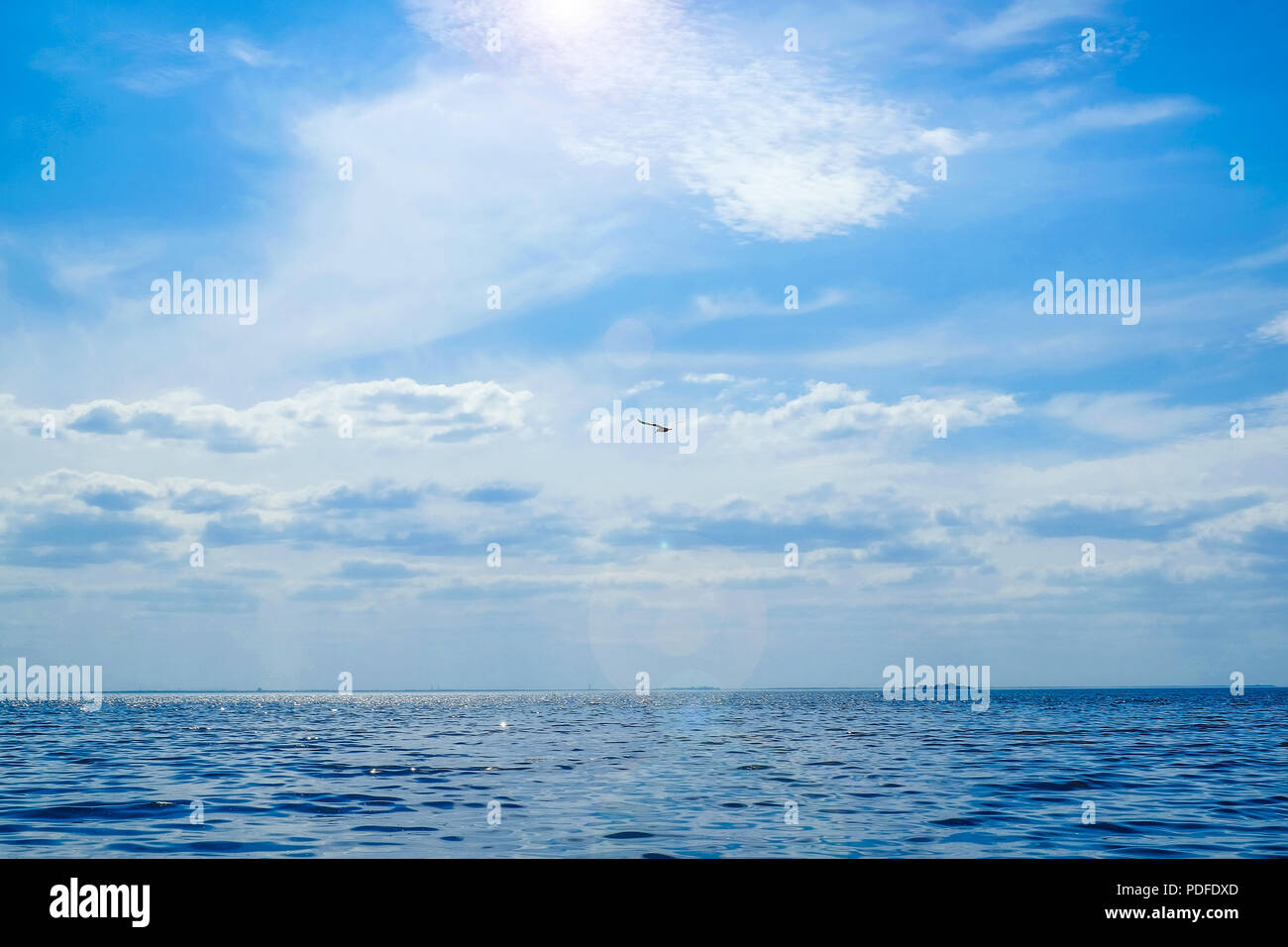 Blue Sky with clouds, a warm summer day Stock Photo - Alamy