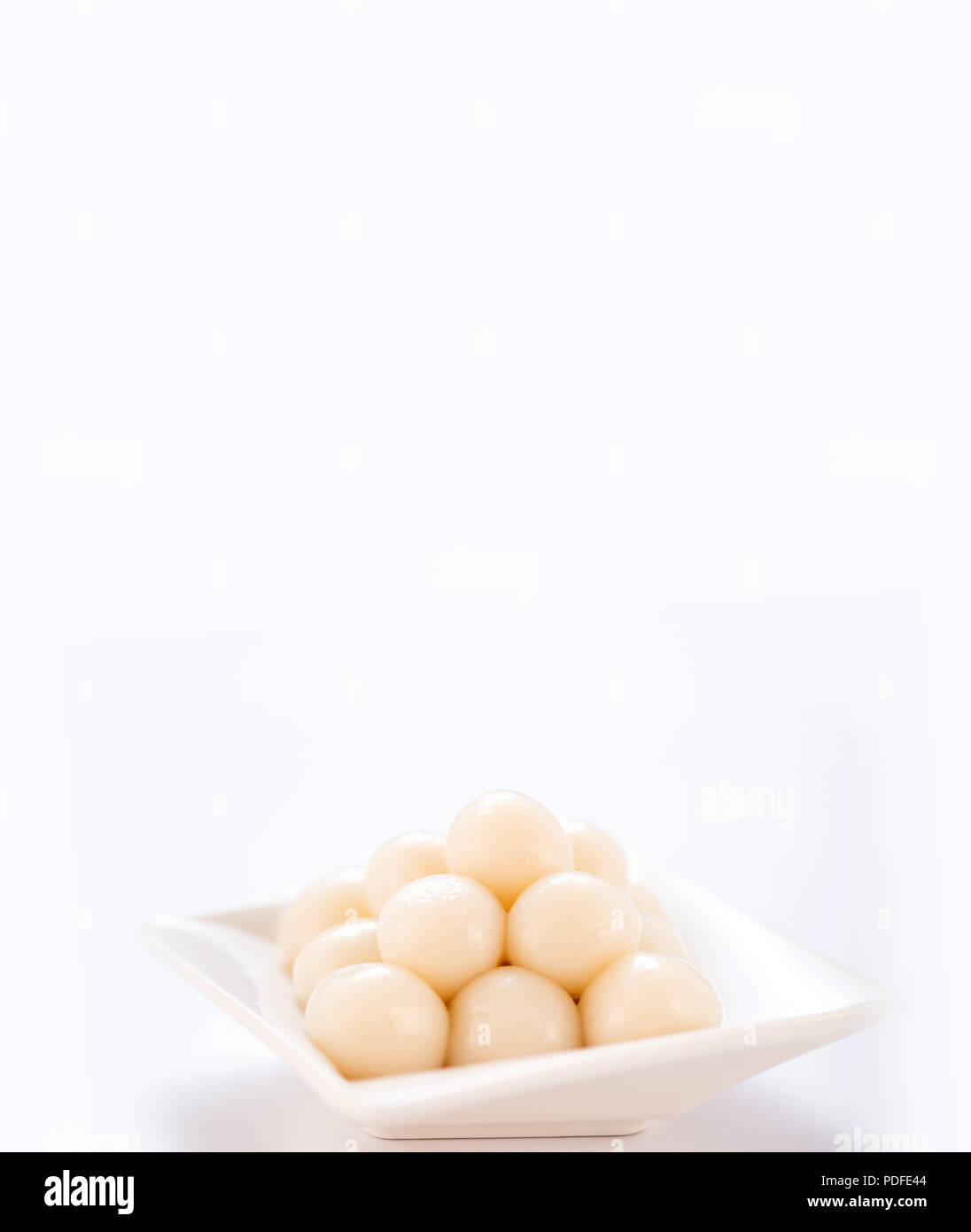 Japanese Dango dessert with 3 different color in pink(red), white, and ...