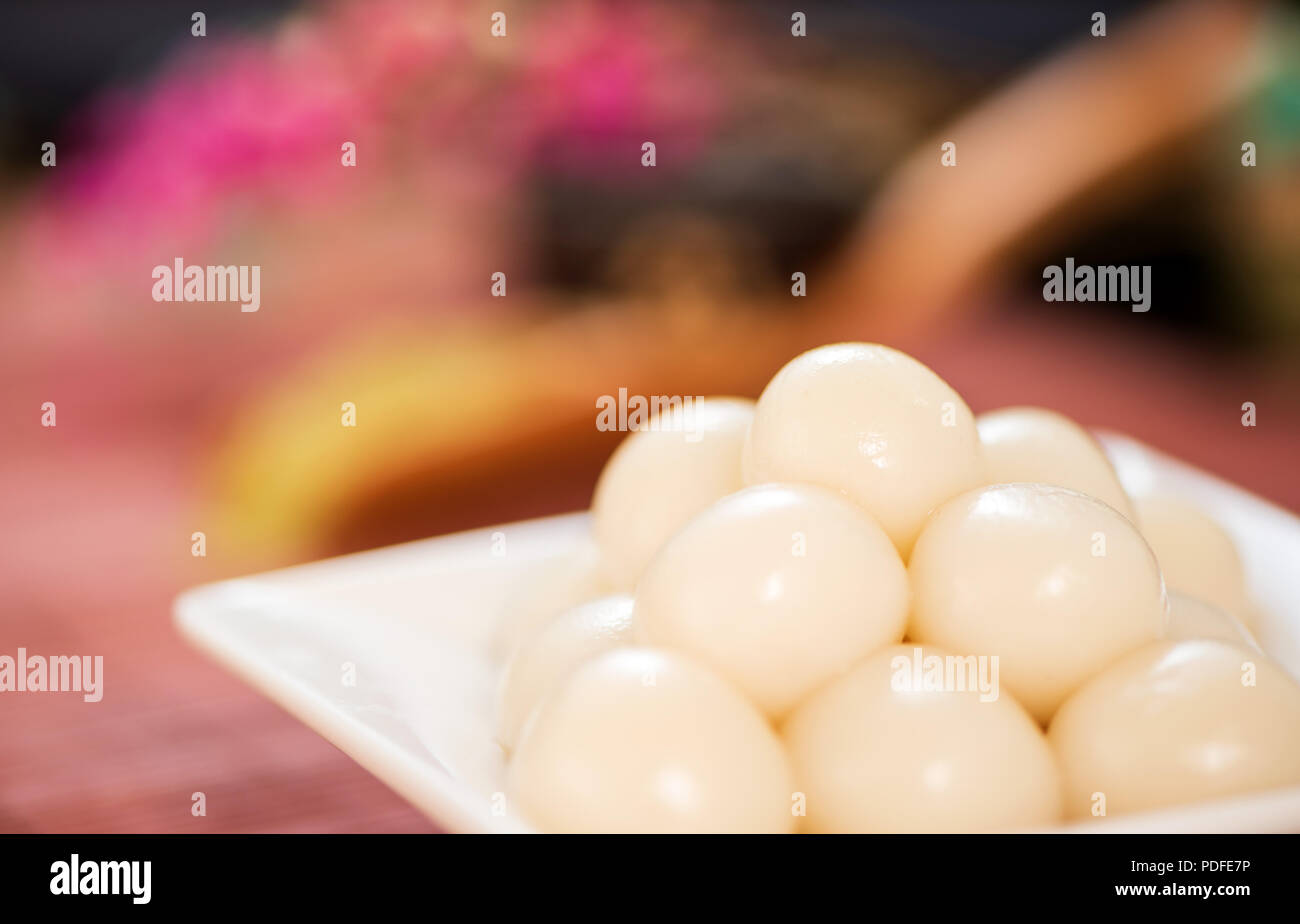 Japanese Dango dessert with 3 different color in pink(red), white, and ...