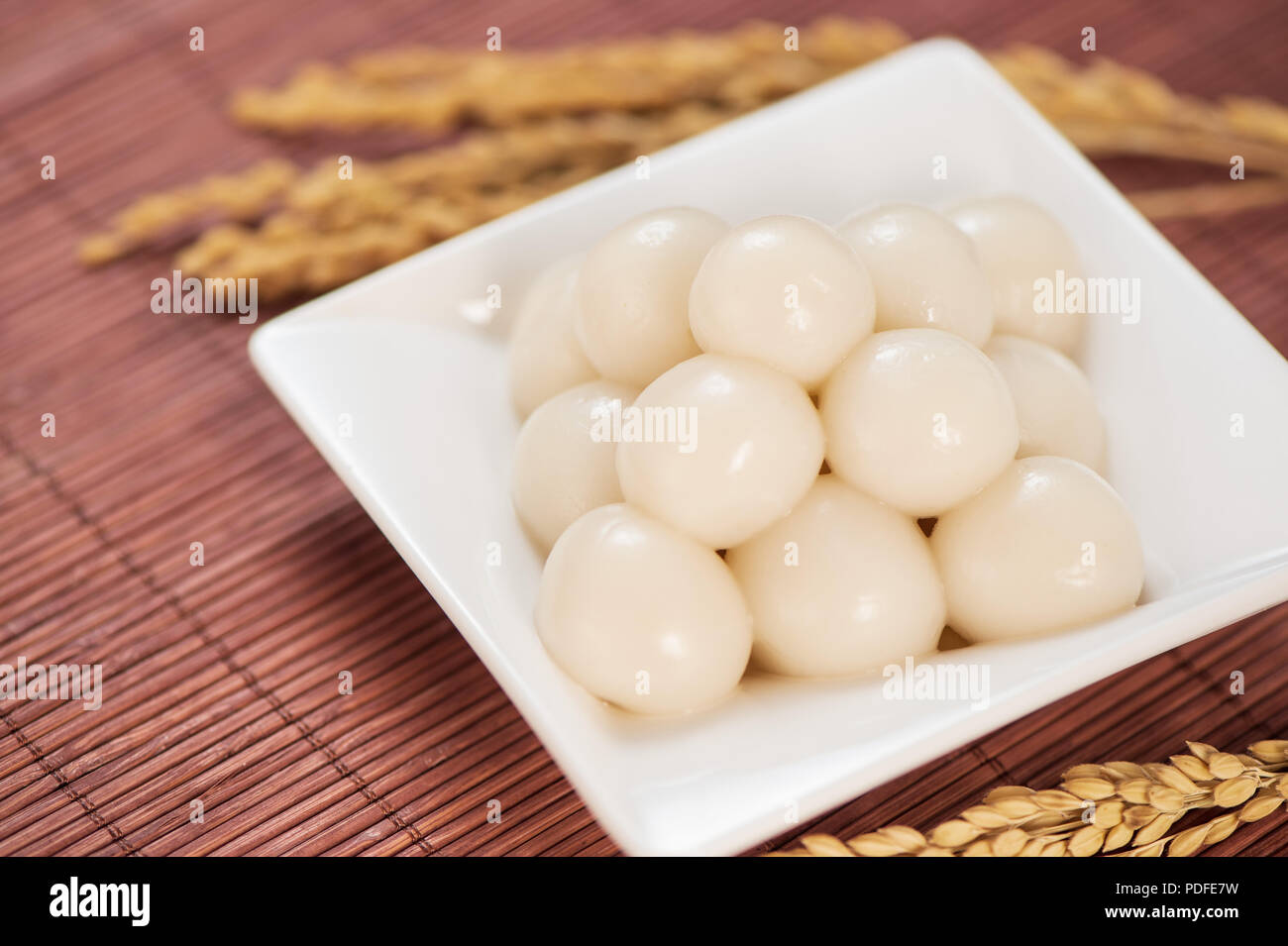 Japanese Dango dessert with 3 different color in pink(red), white, and ...