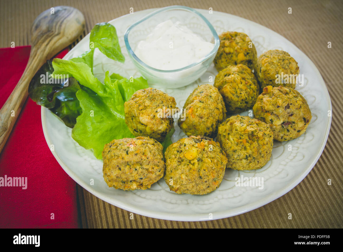 falafel ball and dip sauce Stock Photo - Alamy