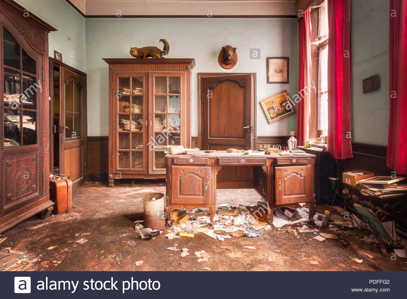 Decaying interior of an abandoned building with peeling paint and ...