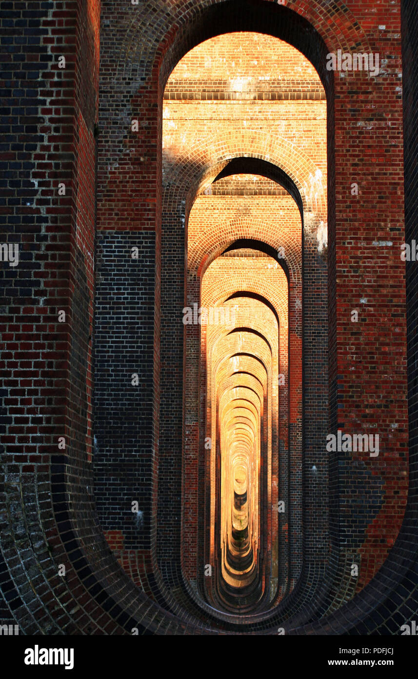 Sunlit viaduct arches hi-res stock photography and images - Alamy