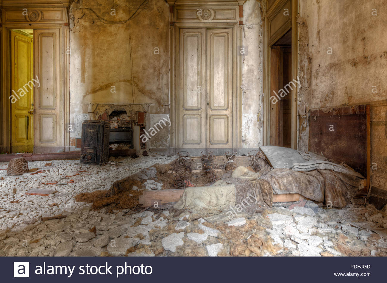 Decaying interior of an abandoned building with peeling paint and ...
