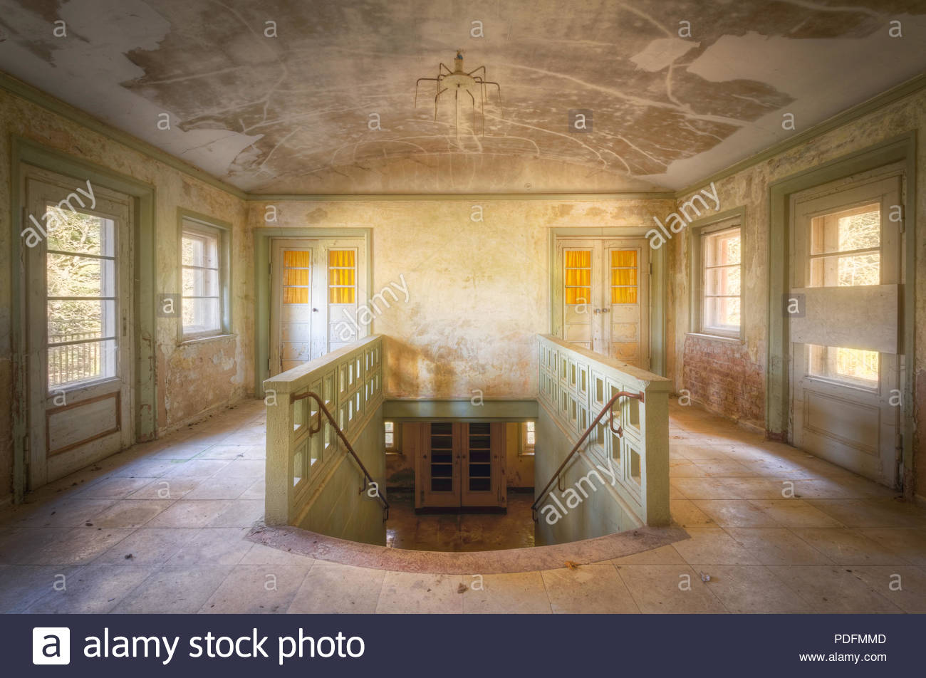 Decaying interior of an abandoned building with peeling paint and ...