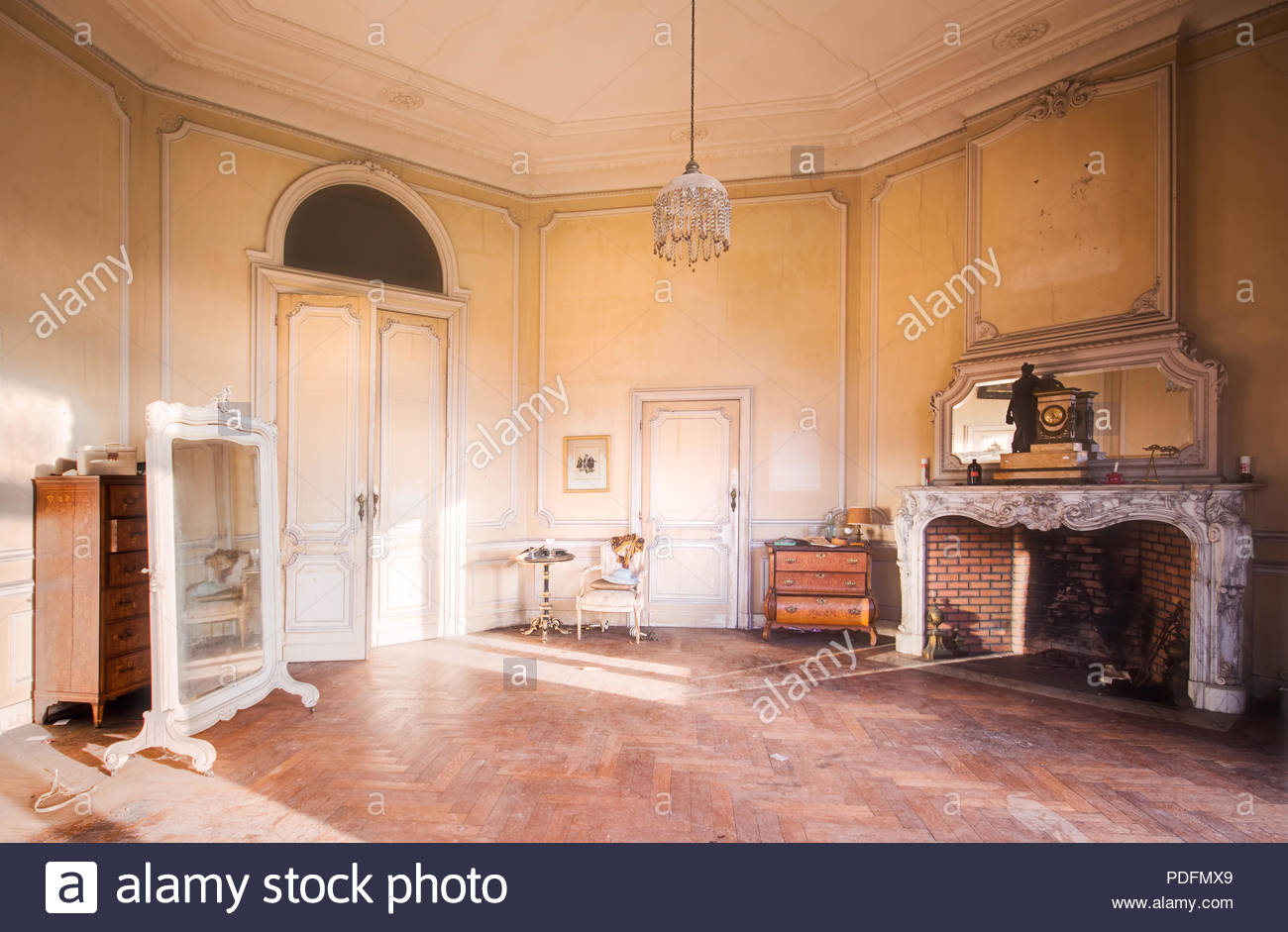 Decaying interior of an abandoned building with peeling paint and ...