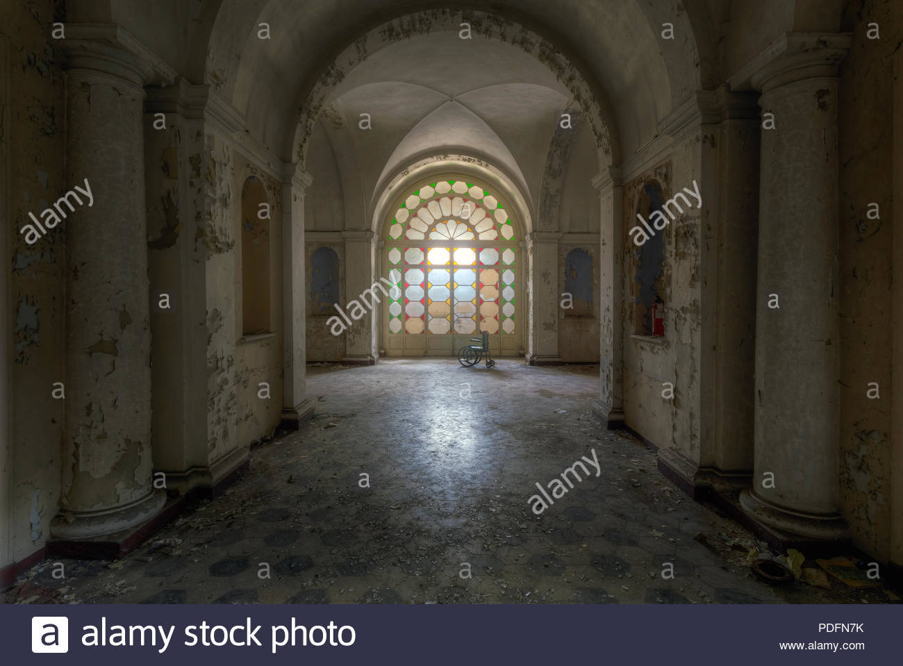 Decaying interior of an abandoned building with peeling paint and ...