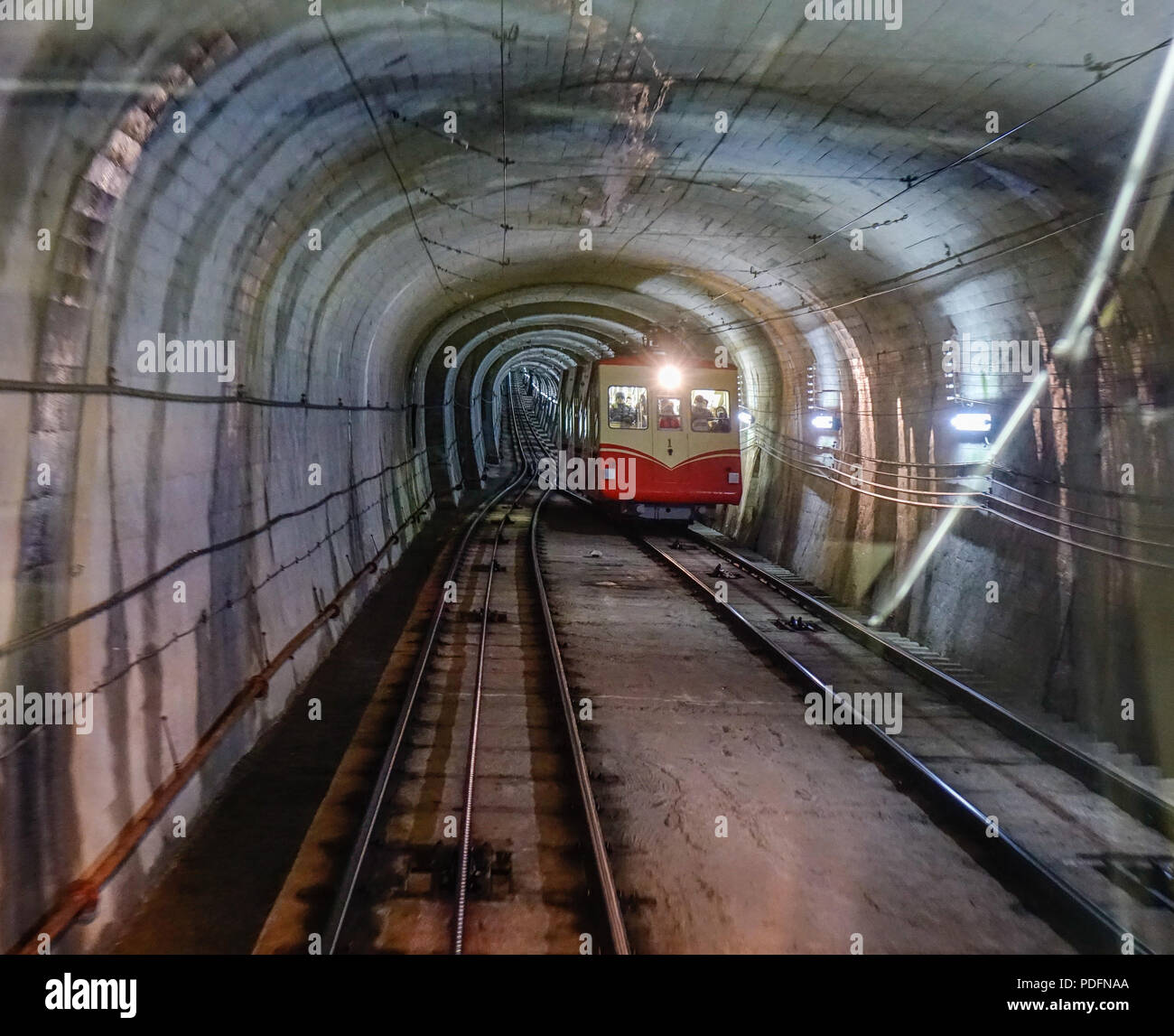 Toyama, Japan - Oct 4, 2017. Underground rail track with tunnel at ...