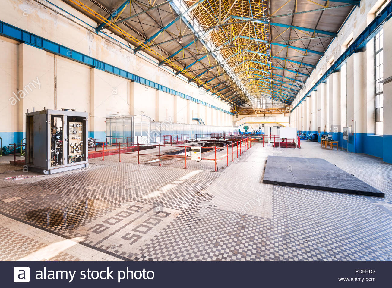 Decaying interior of an abandoned building with peeling paint and ...