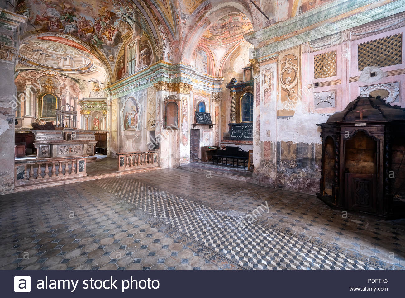 Decaying interior of an abandoned building with peeling paint and ...