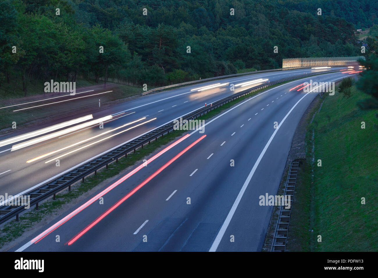 Highspeed traffic on highway, autobahn, busy road, safety commuting ...