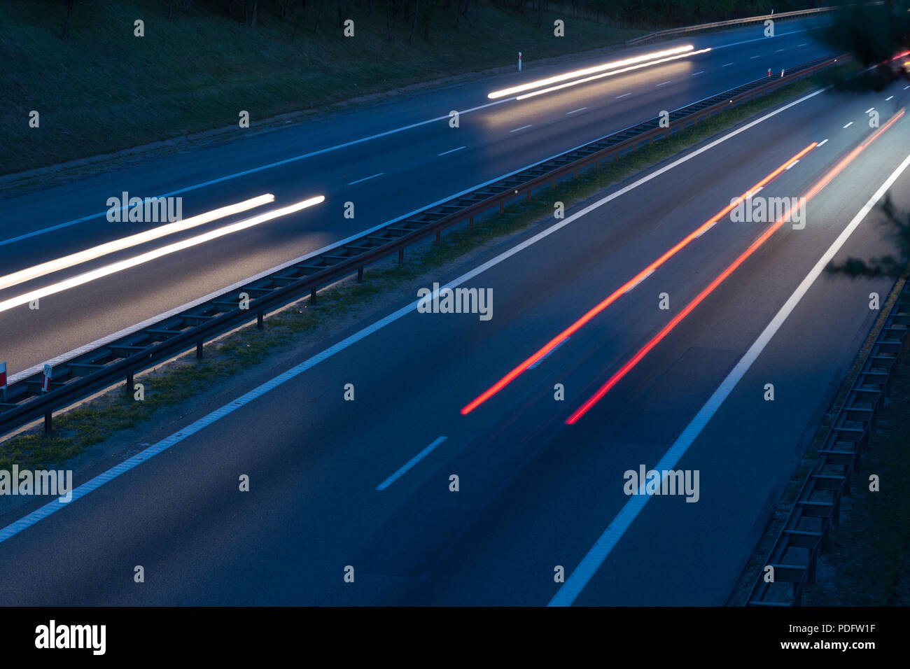 Highspeed traffic on highway, autobahn, busy road, safety commuting ...