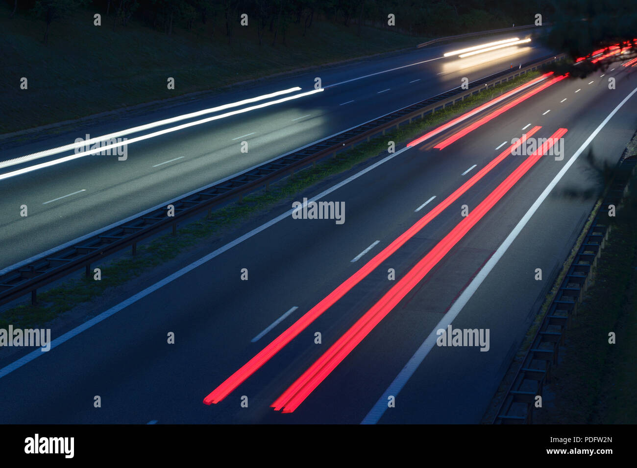 Highspeed traffic on highway, autobahn, busy road, safety commuting ...