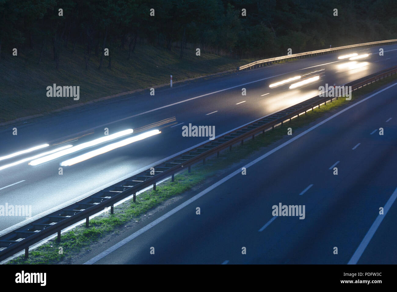 Highspeed traffic on highway, autobahn, busy road, safety commuting ...