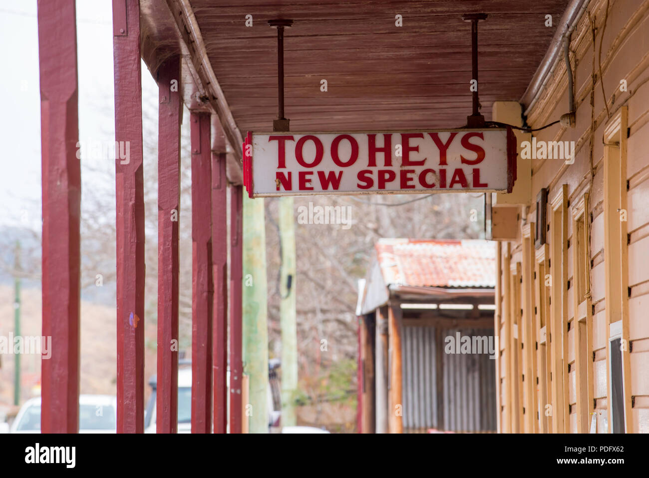A Tooheys beer sign hangs below the upper balcony of the Royal Hotel in ...