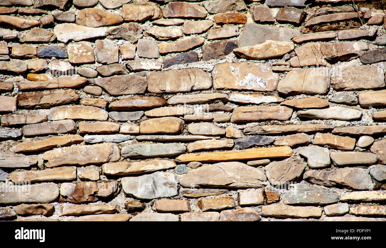 Texture of old rock wall for background Stock Photo - Alamy