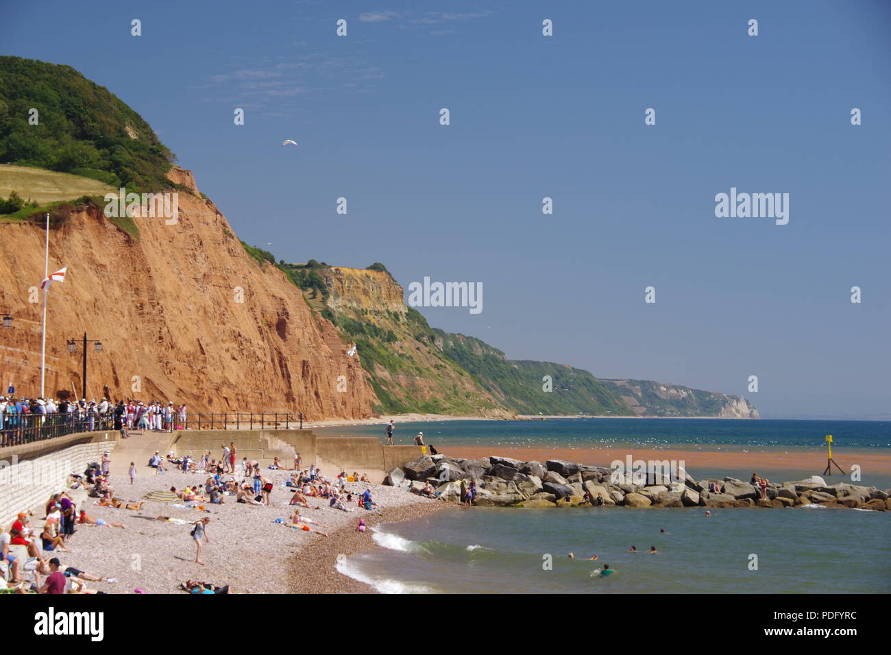 Looking East towards the Red Sandstone Cliff of High Peak and the Chalk ...