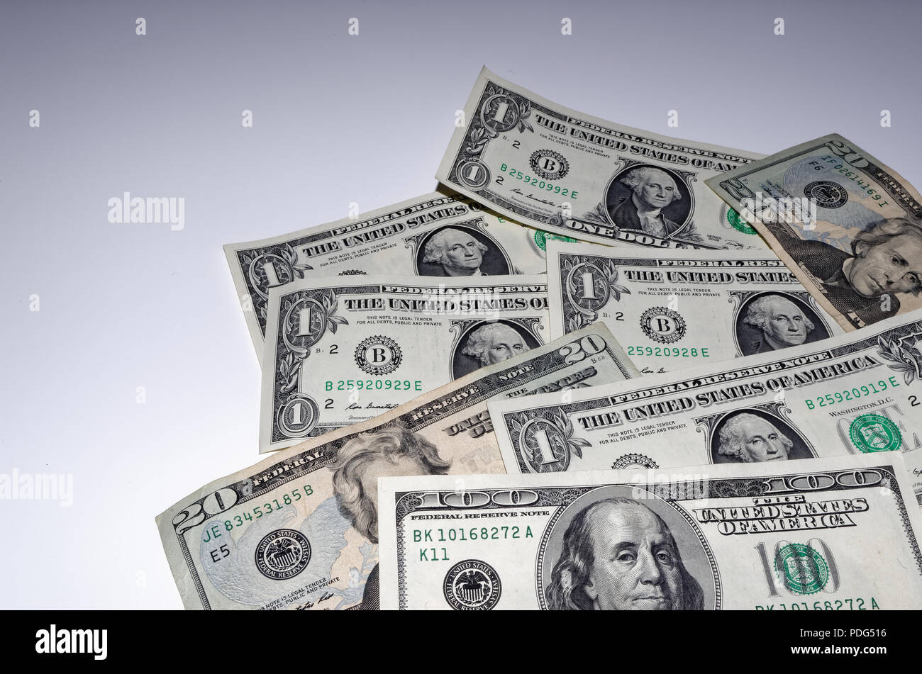 American dollars are laid out on white background Stock Photo - Alamy