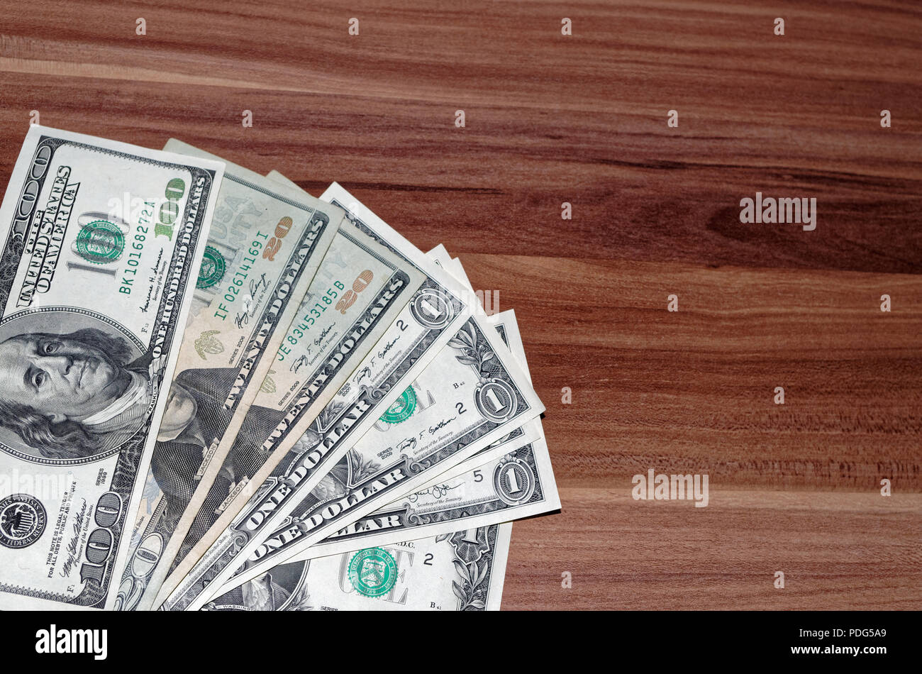 Dollar banknotes laid out in a corner Stock Photo - Alamy