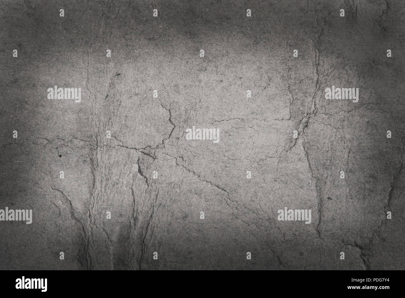 Old hard cracked paper background in dark colors Stock Photo - Alamy