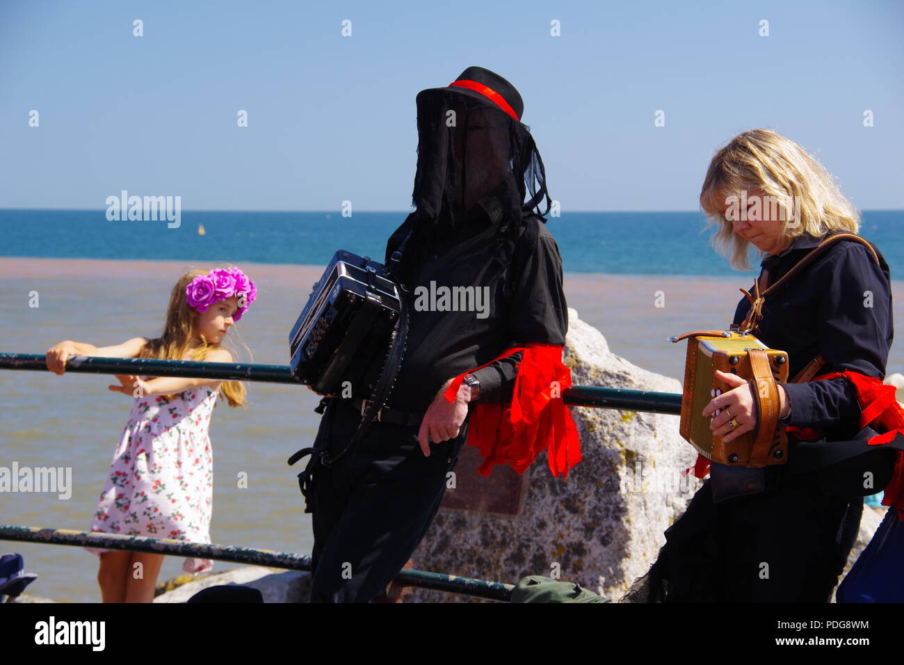 Flag and Bone Gang Morris Dancers Melodeon Players. Sidmouth Folk ...