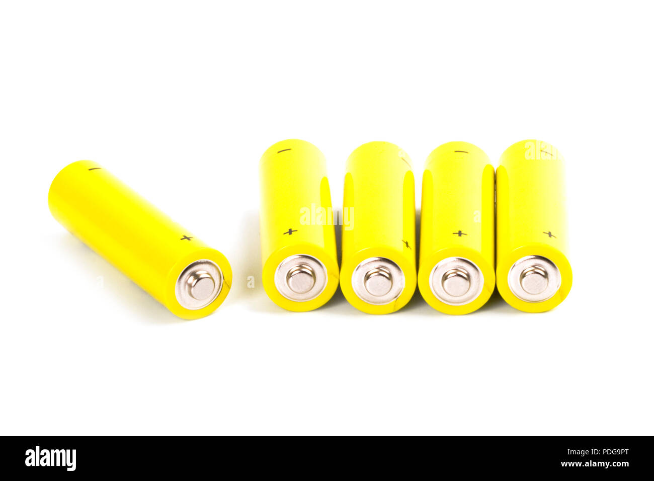 five yellow alkaline batteries isolated on white backgroun Stock Photo ...