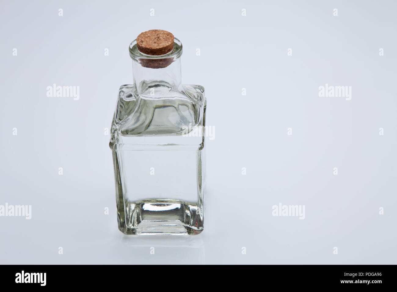 bottle of clear liquid on the white background Stock Photo - Alamy