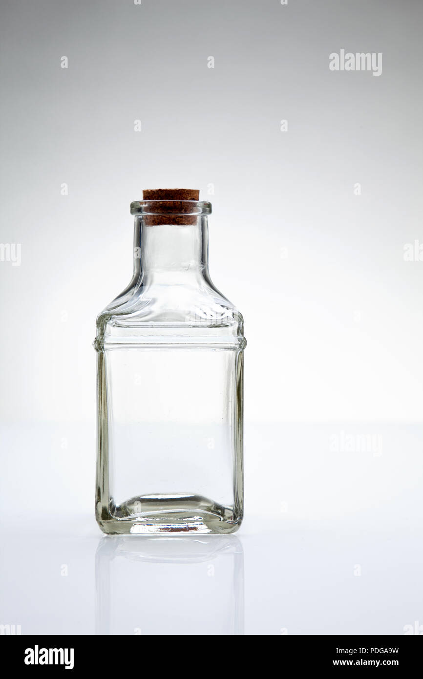bottle of clear liquid on the white background Stock Photo - Alamy