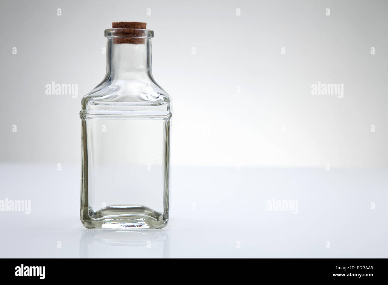 bottle of clear liquid on the white background Stock Photo - Alamy