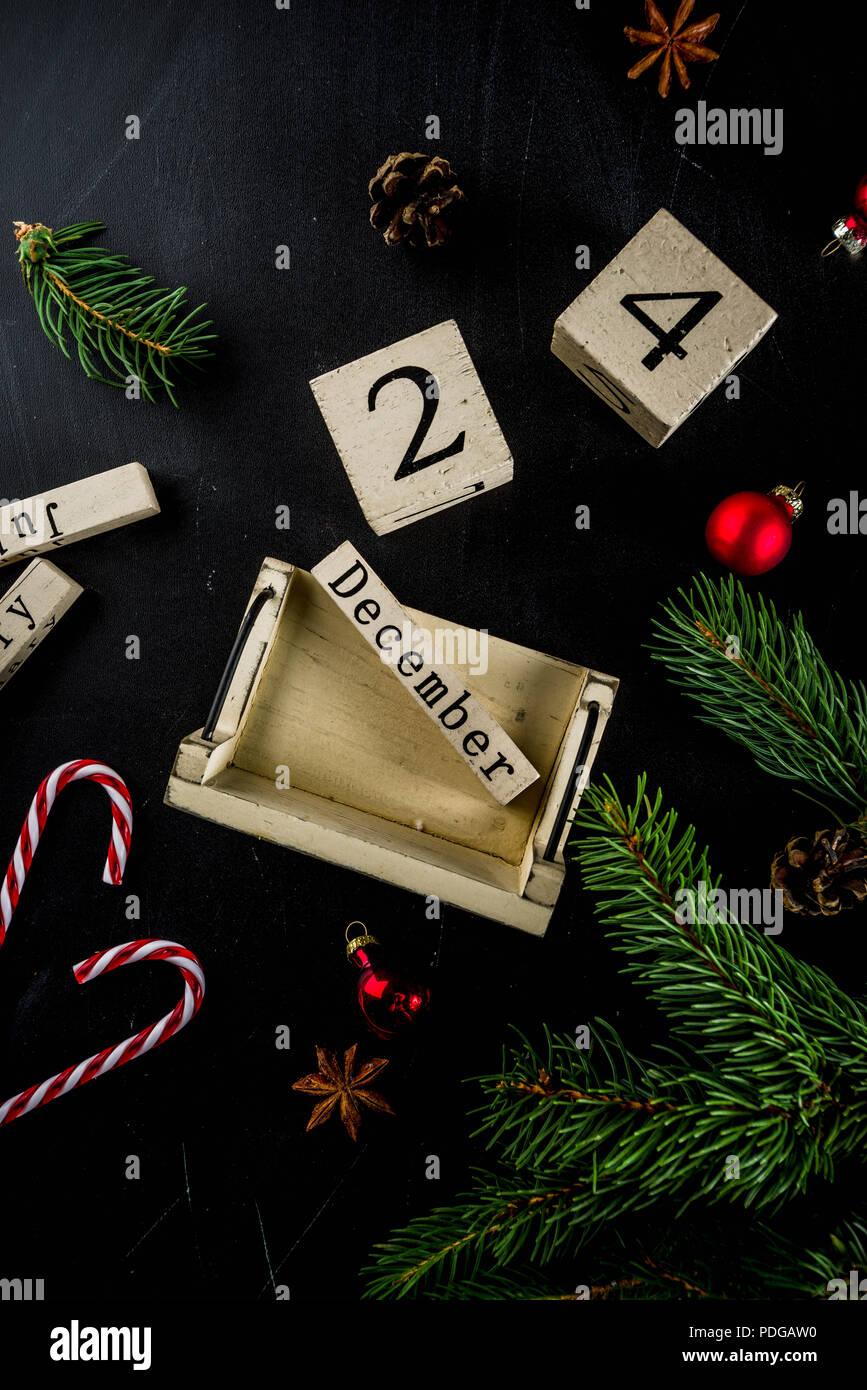 Christmas concept with decorations, fir tree branches, with calendar ...