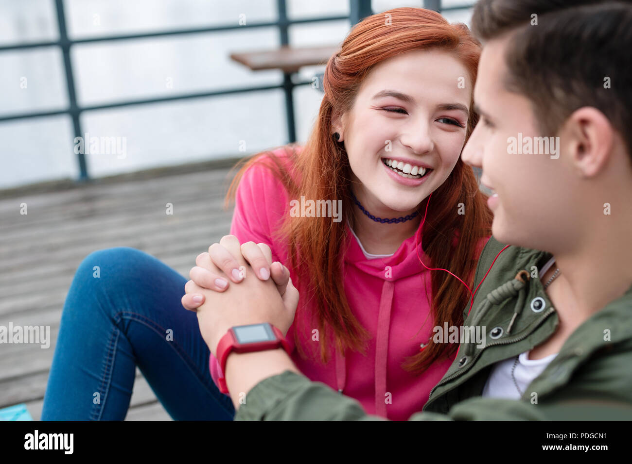 Happy nice woman smiling to her boyfriend Stock Photo - Alamy