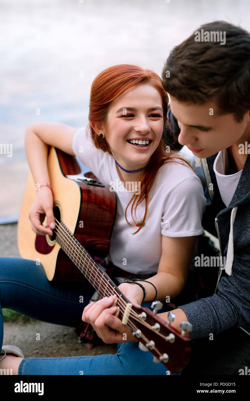 Happy joyful woman playing music Romantic date Stock Photo - Alamy