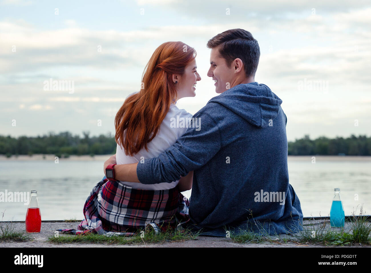 Positive young couple being in love Romantic date Stock Photo - Alamy