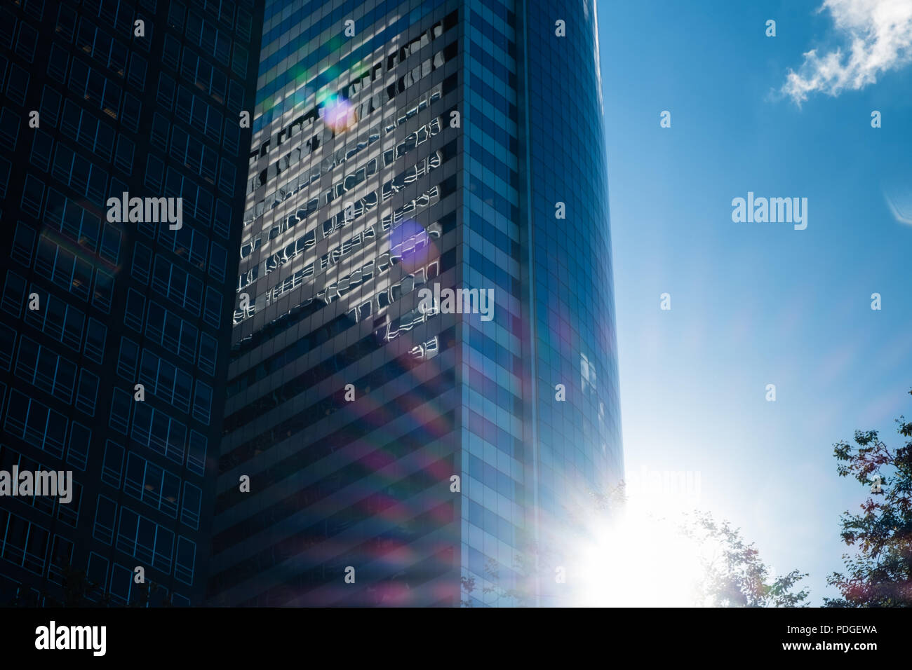 Reflections and flare on New York skyscraper Stock Photo - Alamy