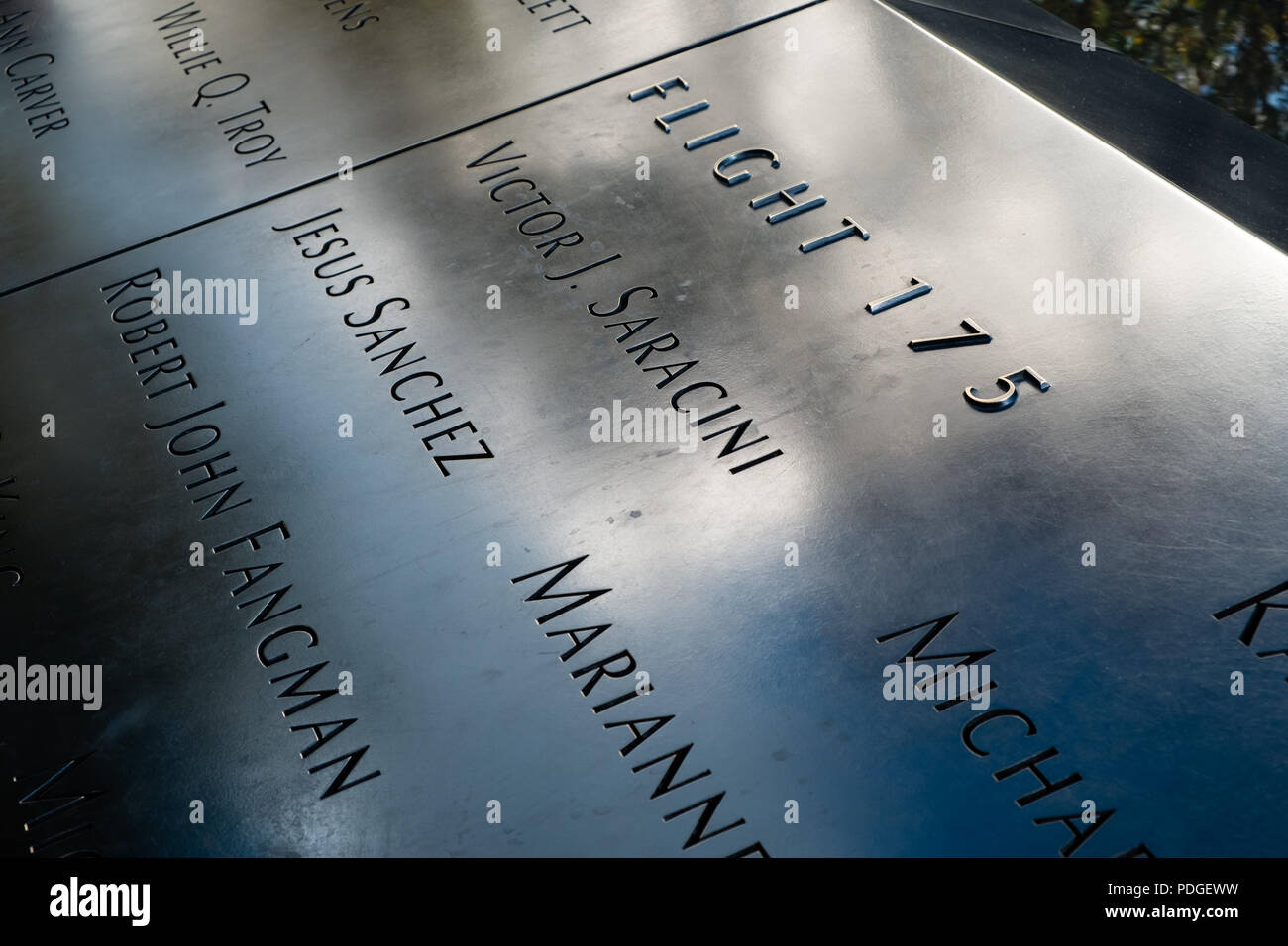 Reflections on a panel of the 9/11 memorial 4 Stock Photo - Alamy