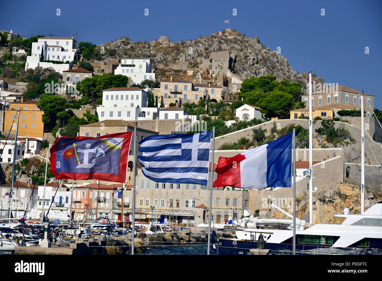 Waving flags in Hydra town, Hydra island, Greece Stock Photo - Alamy