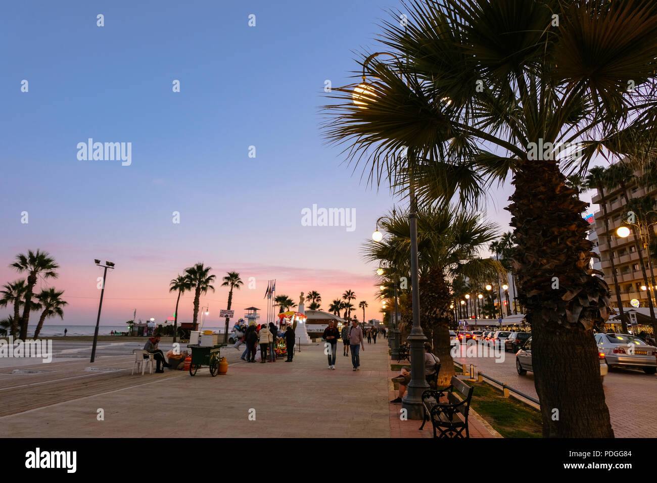 LARNACA, CYPRUS - January 5, 2018: People on the sidewalk at Finikoudes ...