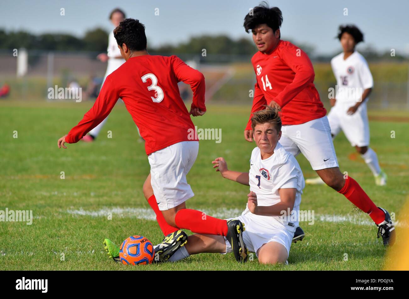 Sports soccer tackle hi-res stock photography and images - Alamy