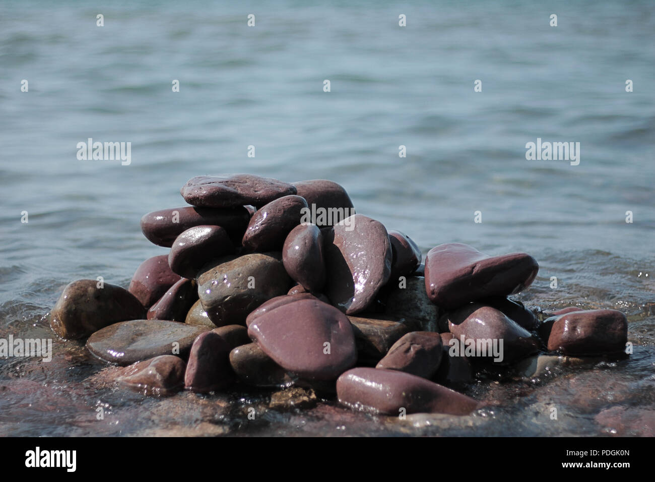 A Pile of Rocks on The Beach Stock Photo - Alamy