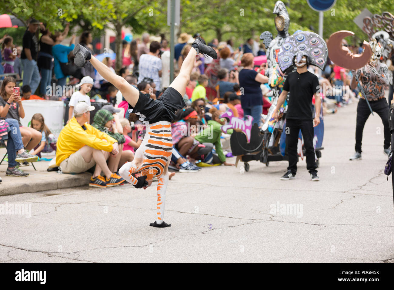 Cleveland, Ohio, USA - June 9, 2018 an acrobat with colorful body paint ...