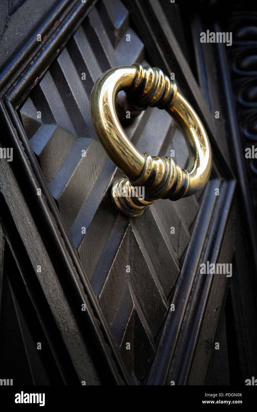 Gold Ring Handle on Door Stock Photo - Alamy
