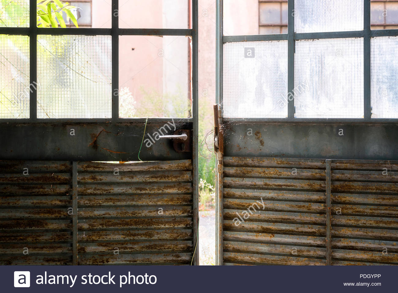 Decaying interior of an abandoned building with peeling paint and ...