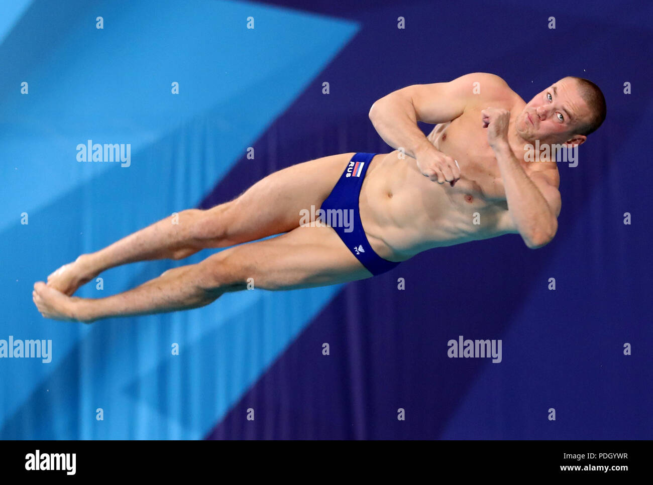 Russia's Evgenii Kuznetsov in action in the Men's 3m Springboard diving competition during day ...