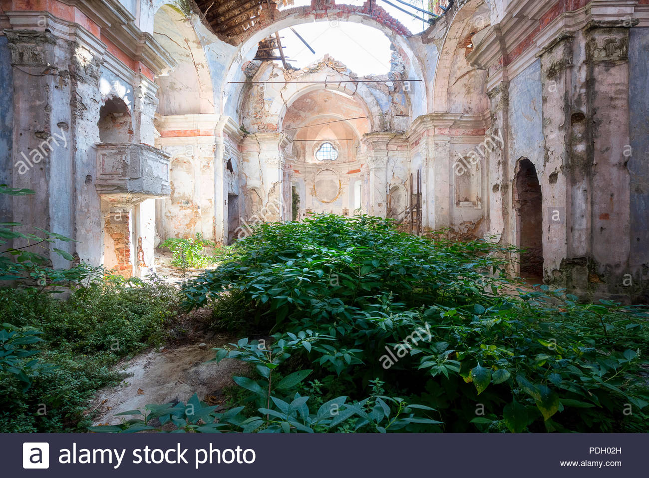 Decaying interior of an abandoned building with peeling paint and ...
