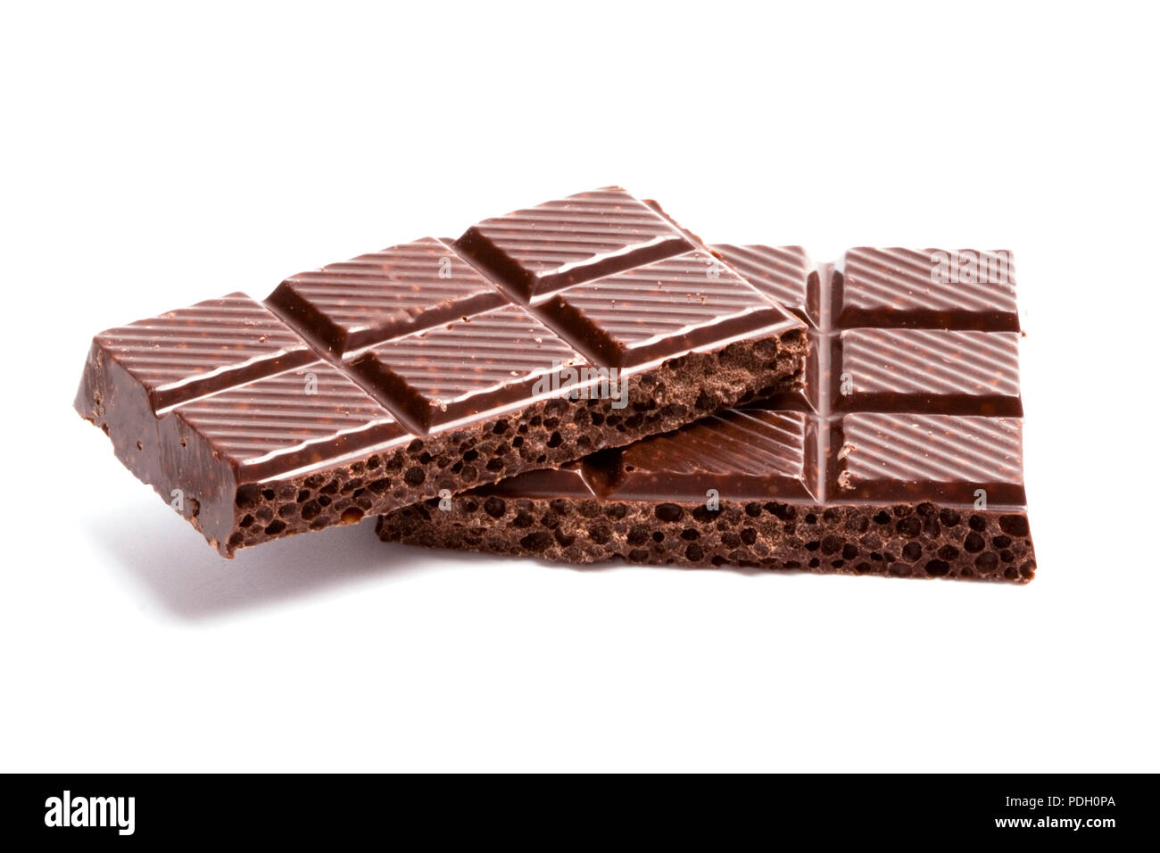 two black chocolate blocks isolated on white background Stock Photo - Alamy