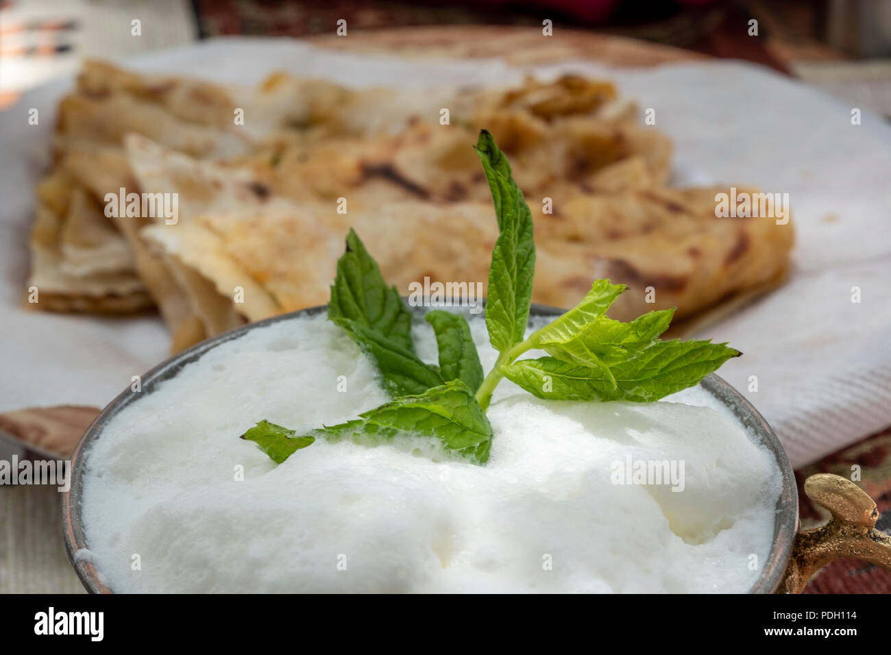 Traditional Turkish meal Gozleme with ayran on the table Stock Photo ...