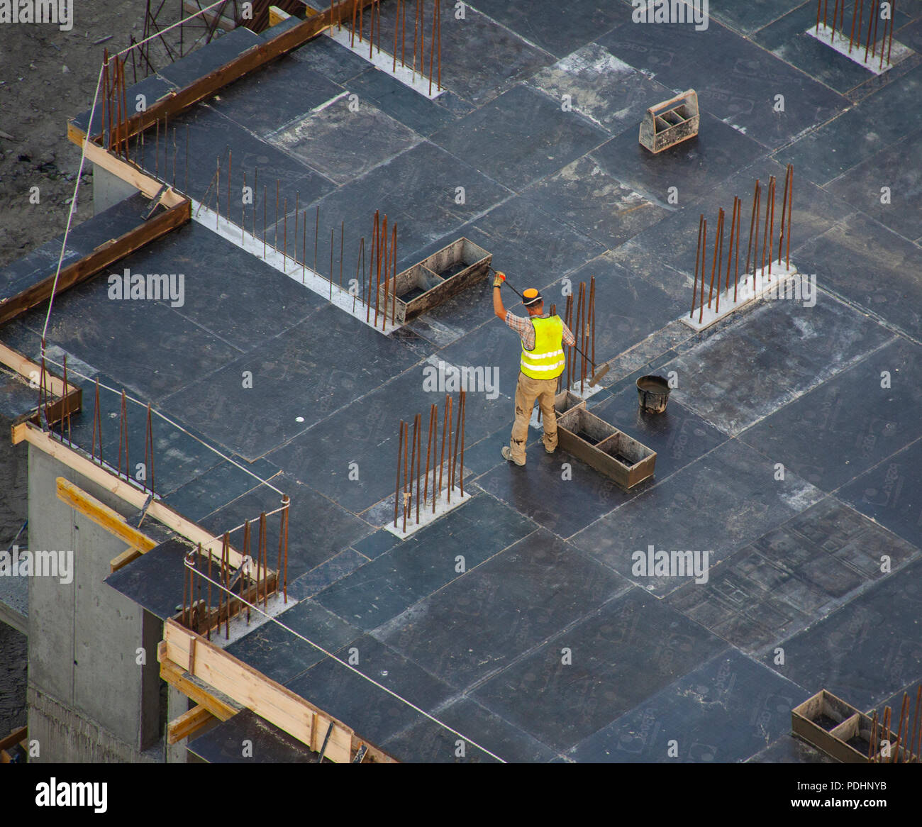 Construction worker on construction site Stock Photo - Alamy